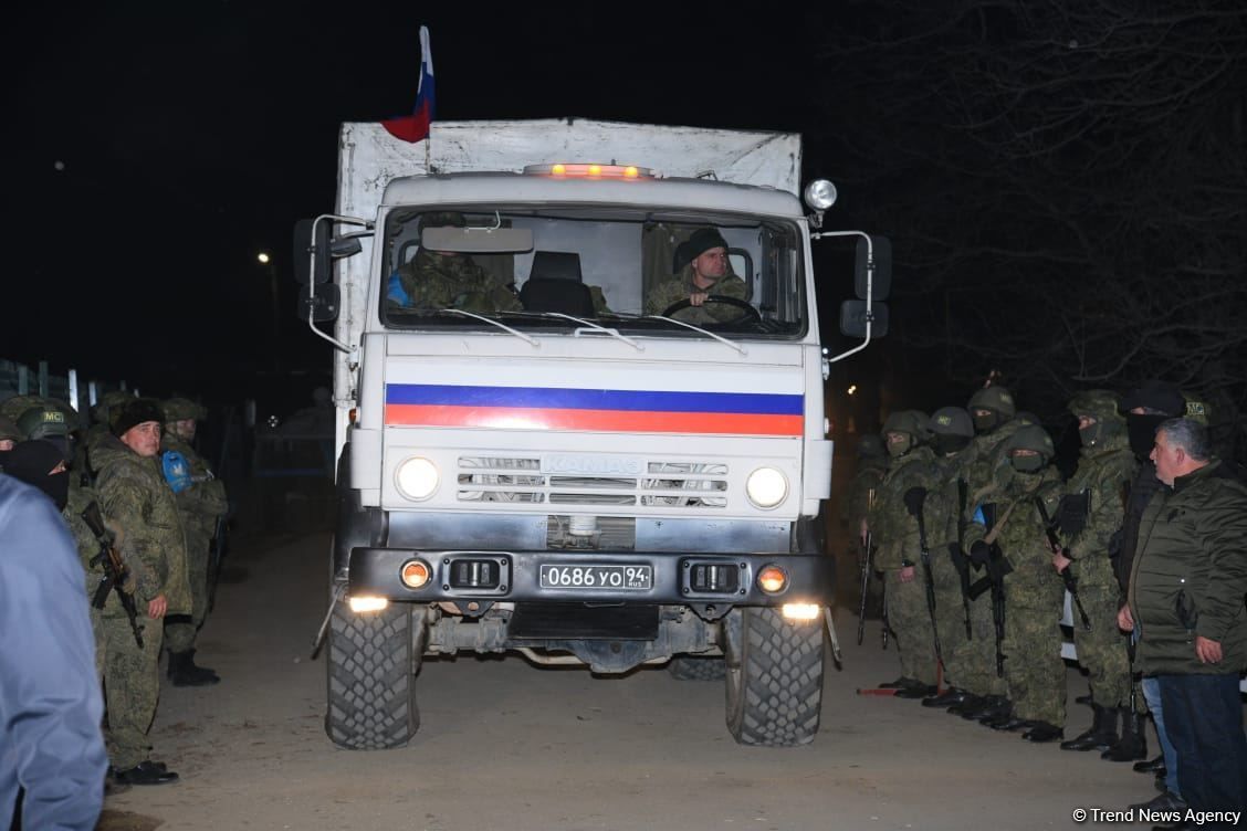 Russian peacekeepers' supply vehicles pass along Lachin road without ...