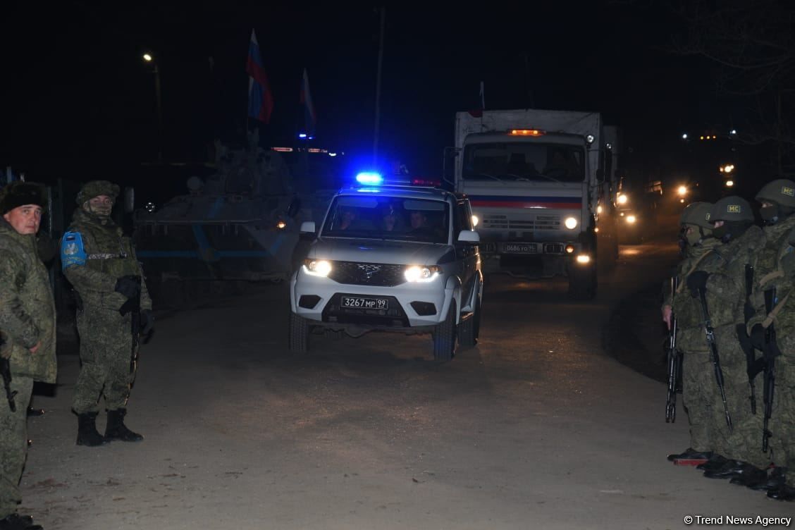 Russian peacekeepers' supply vehicles pass along Lachin road without ...
