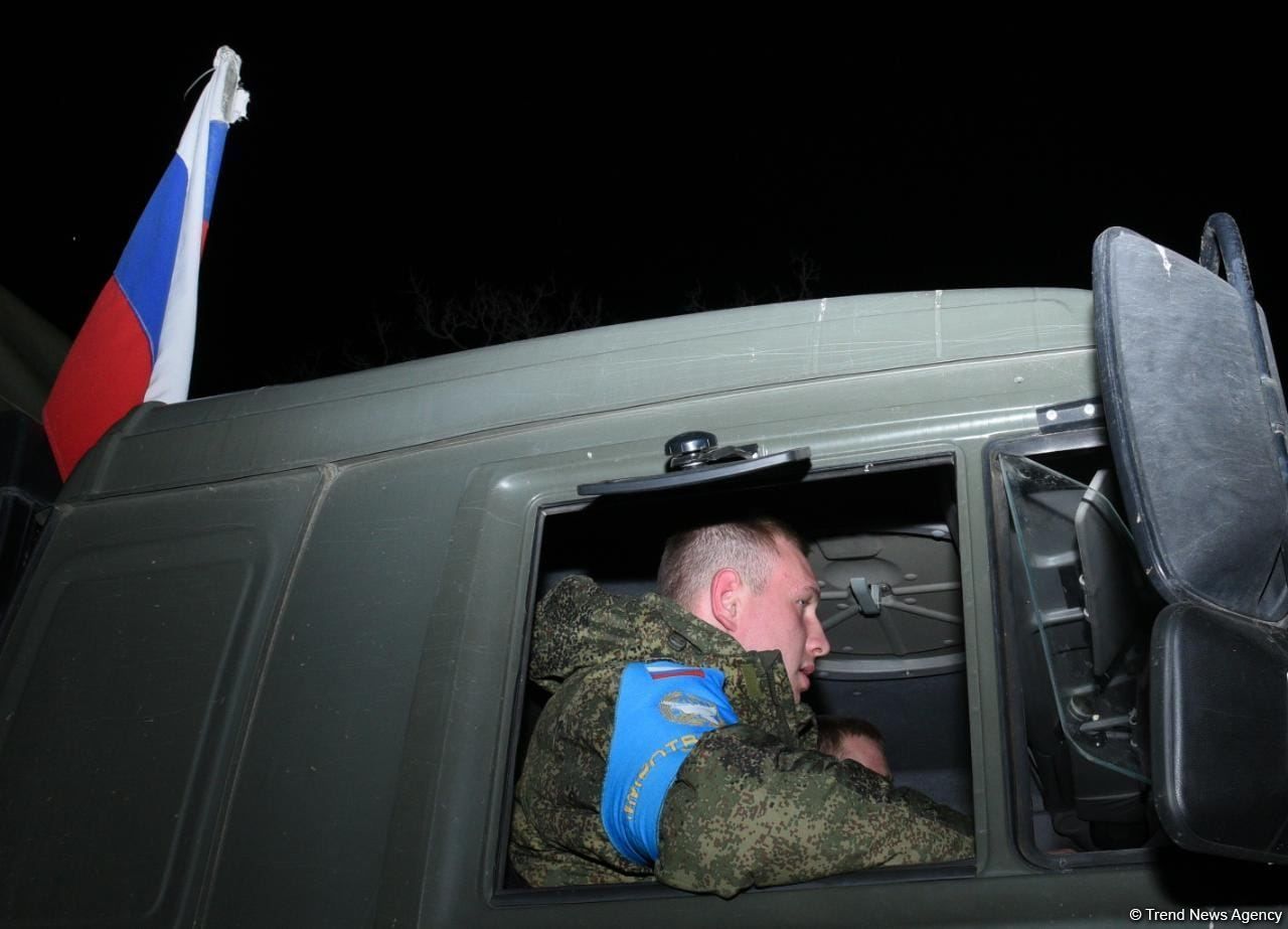 Russian peacekeepers' supply vehicles pass along Lachin road without ...