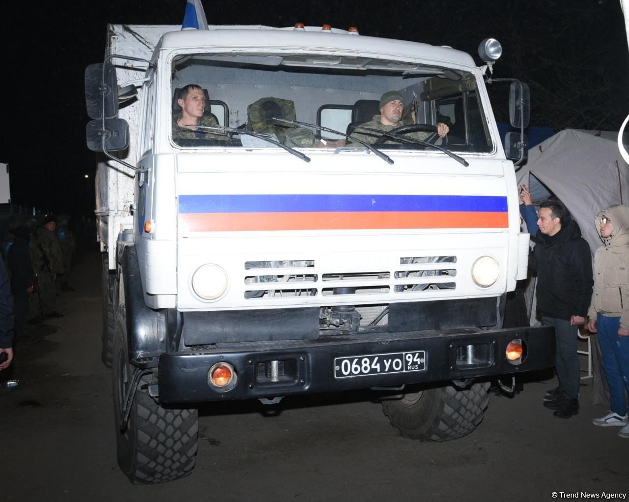 Russian peacekeepers' supply vehicles pass along Lachin road without ...