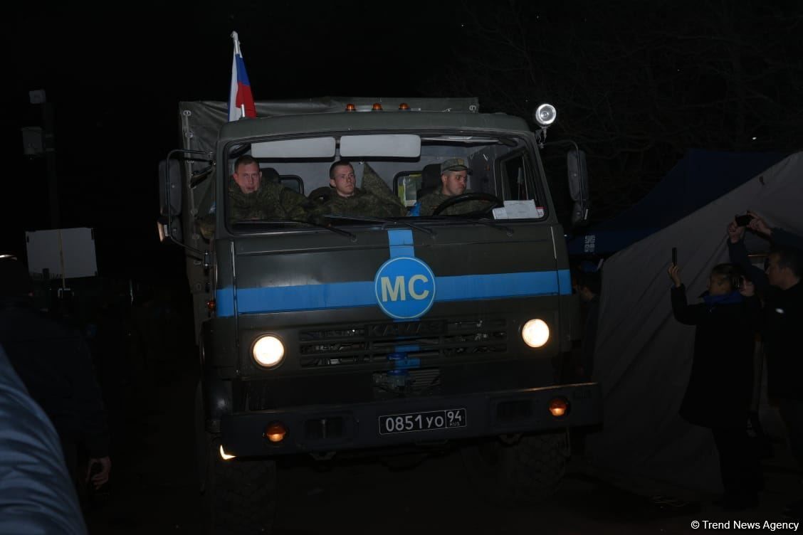 Russian peacekeepers' supply vehicles pass along Lachin road without ...