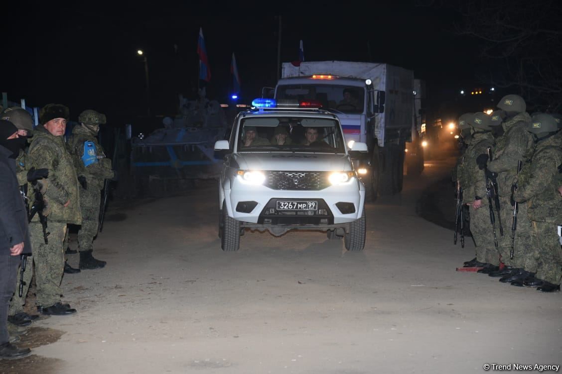 Russian peacekeepers' supply vehicles pass along Lachin road without ...