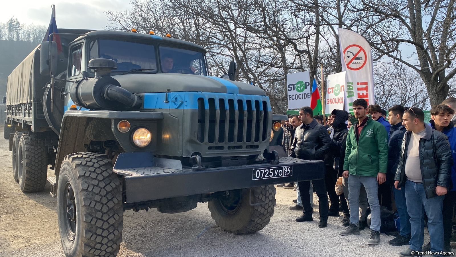 Vehicles of Russian peacekeepers keep passing along Azerbaijan's Lachin ...