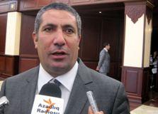 Azeri ruling party urges opposition to submit financial reports