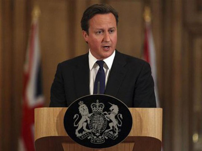 Cameron sees ‘red warning lights’ flashing on global economy