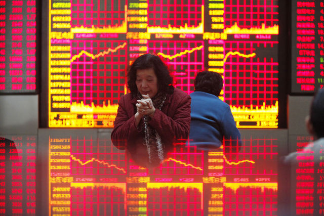 China stocks rise to 3-year high as financials jump on easing